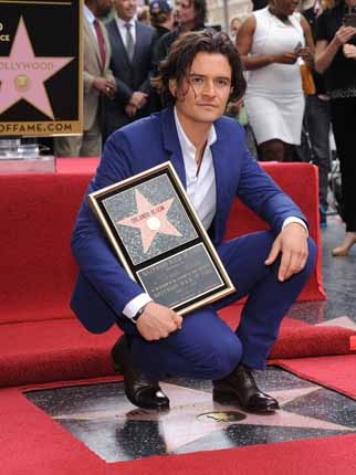 Orlando Bloom, una stella di papà sulla Walk of Fame con il figlio ...